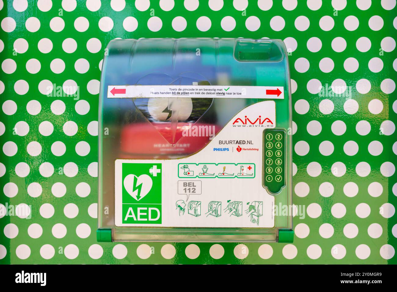 Dieren, The Netherlands - August 6, 2024: Dutch AED defibrillator on a ...