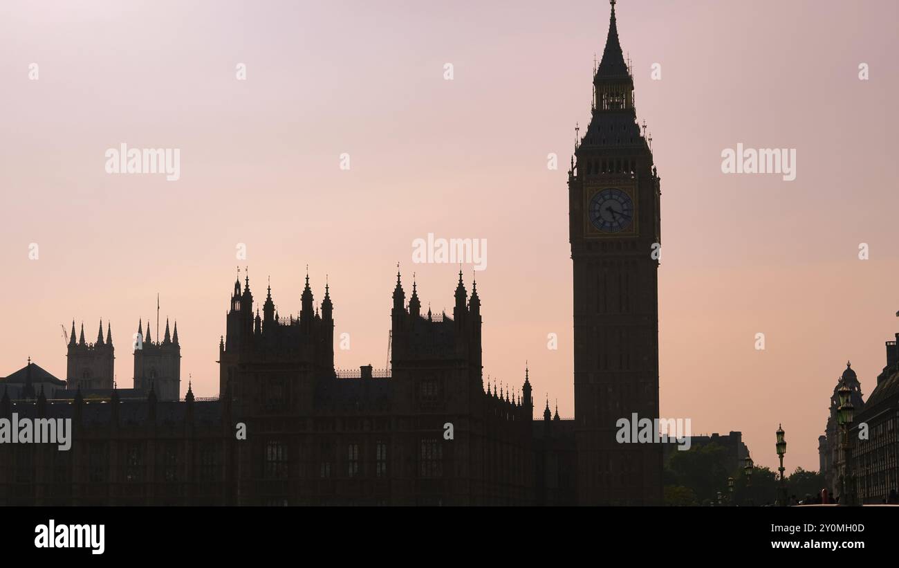 Westminster towers at sunset, iconic London tourist attraction with ...