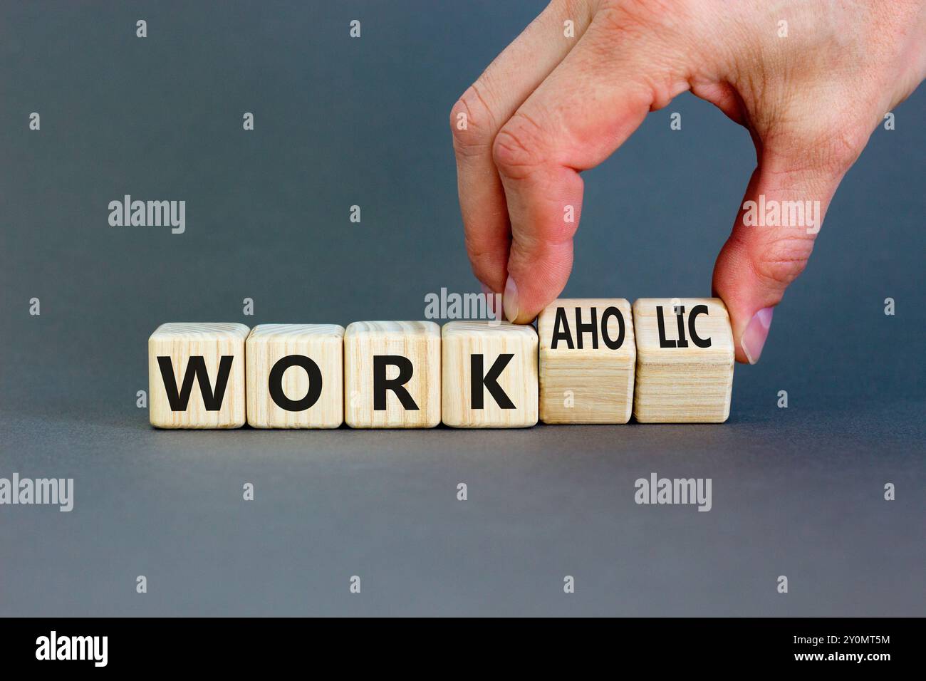 Work or workaholic symbol. Concept words Work or Workaholic on wooden ...