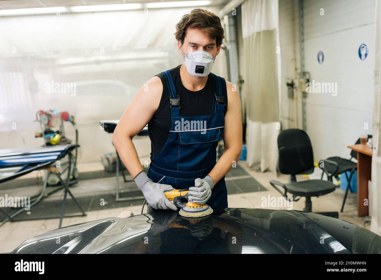 Professional caucasian car detailing worker hi-res stock photography ...