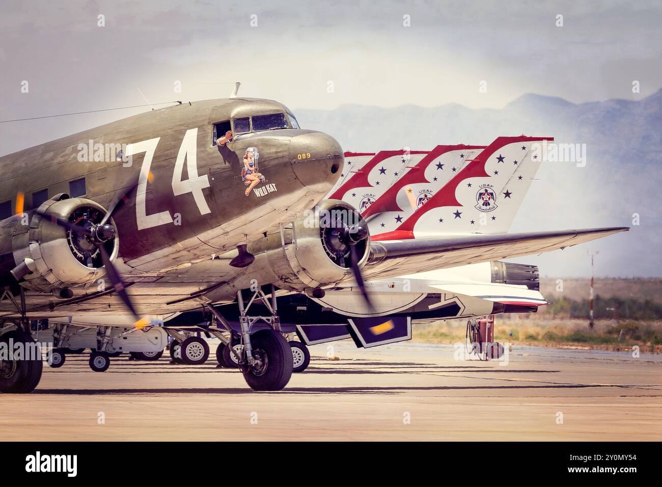A C47 Skytrain named Wild Kat passes the US Air Force Thunderbirds at ...