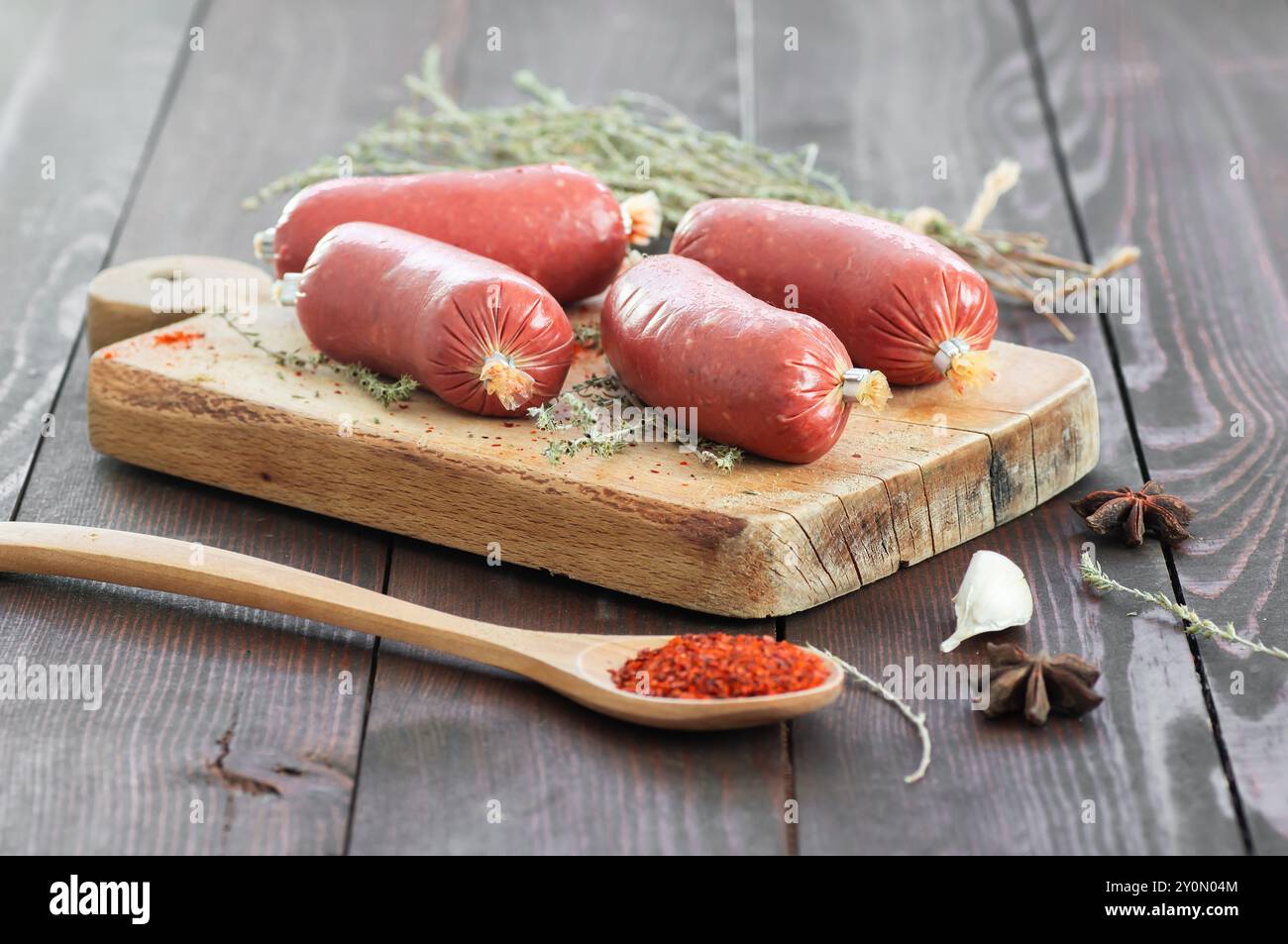 Turkish fermented sausage, dry spicy raw sausage on dark stone ...