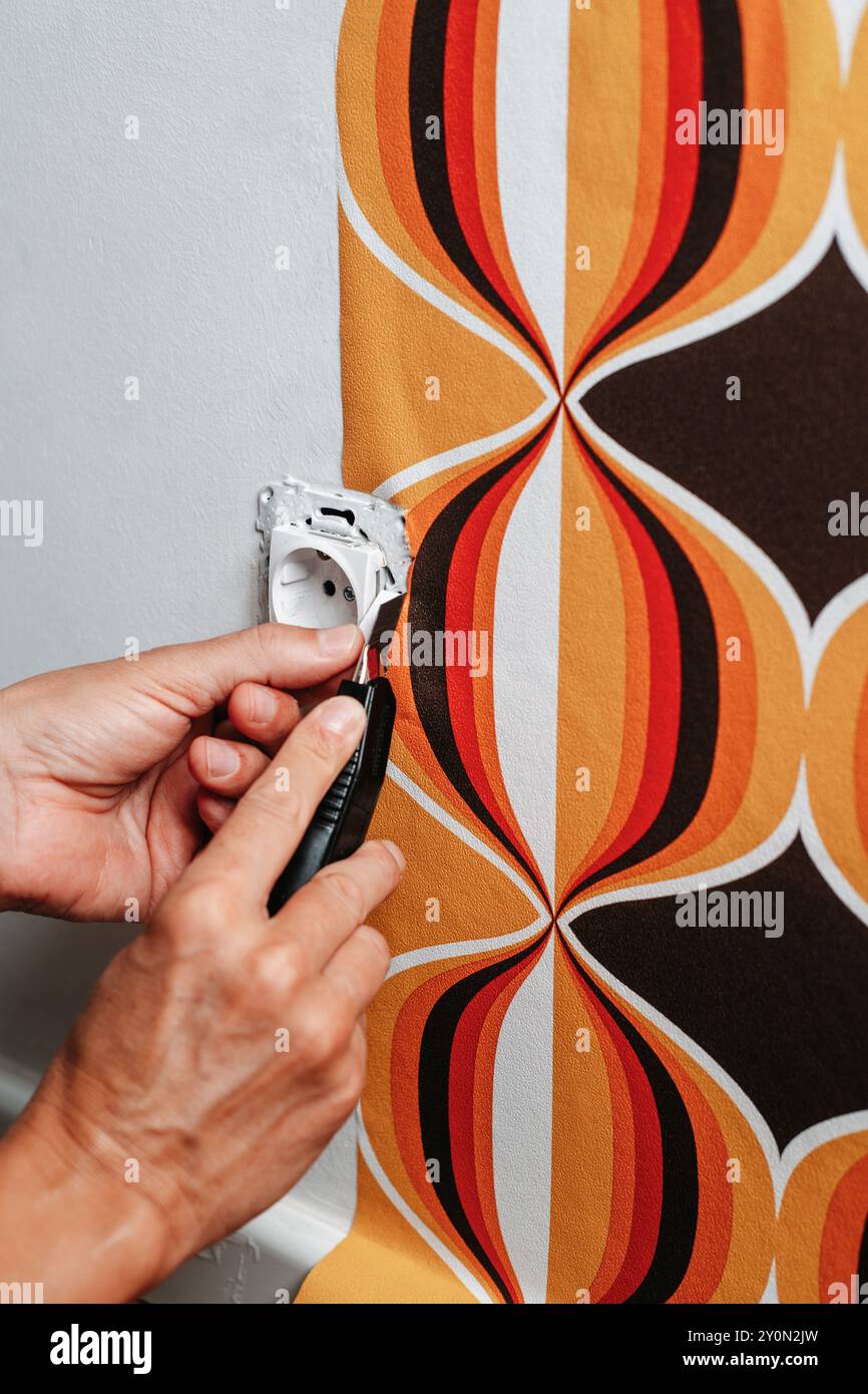 Wallpapering diy socket hi-res stock photography and images - Alamy