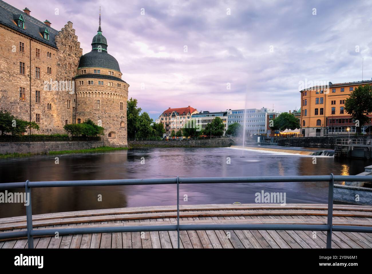 Massive Orebro Castle is a fortification surrounded by Svartan river in ...