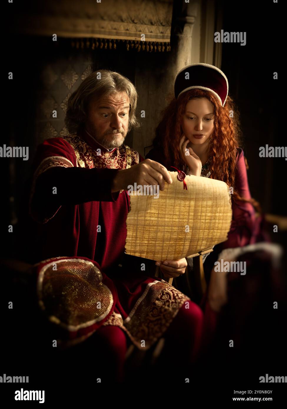 Medieval Renaissance king and queen in Tudor style costumes reenactment ...