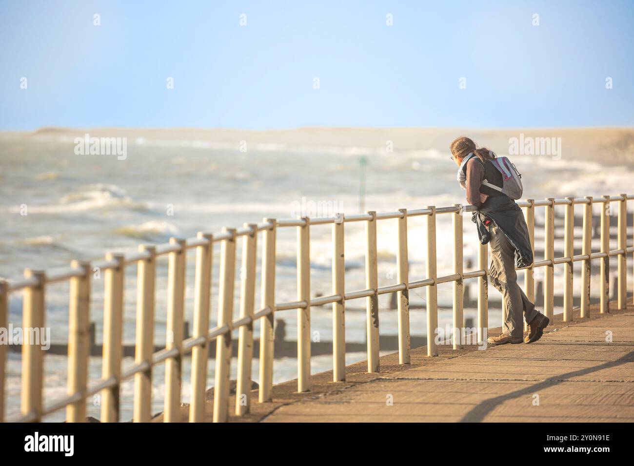 Holiday makers on the promenade at Tywyn Beach, Wales Stock Photo - Alamy