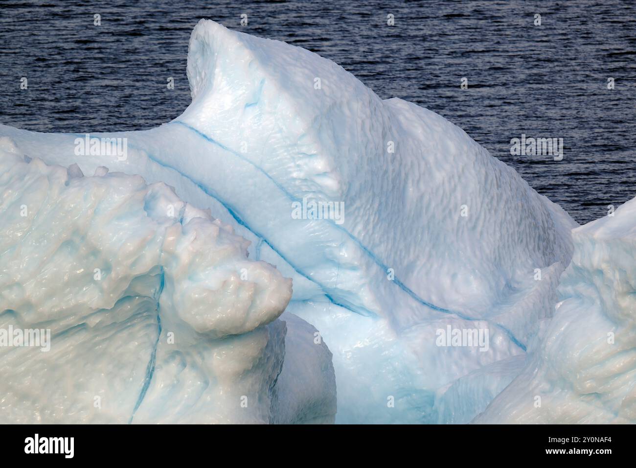 beautiful blue streaks of ice on a small iceberg near nanortalik, greenland Stock Photo - Alamy