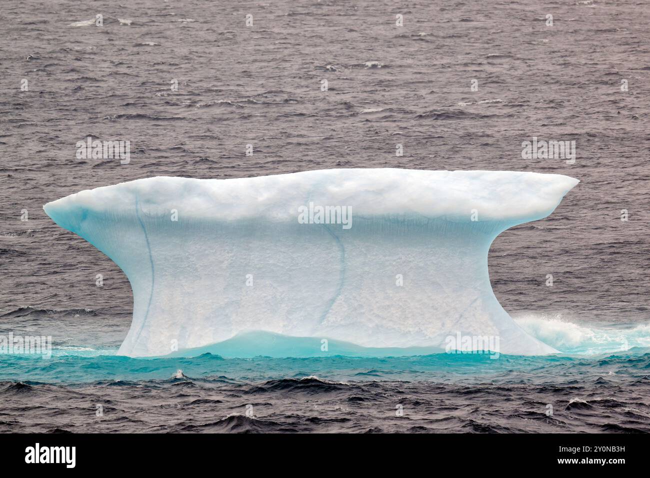 beautiful blue streaks of ice on a small iceberg near nanortalik, greenland Stock Photo - Alamy