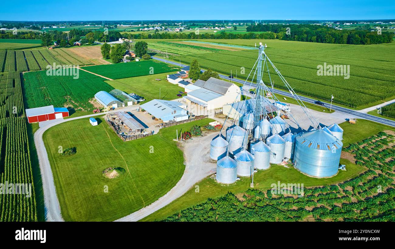 Aerial View of Grain Silos and Farm Buildings in Lush Countryside Stock ...
