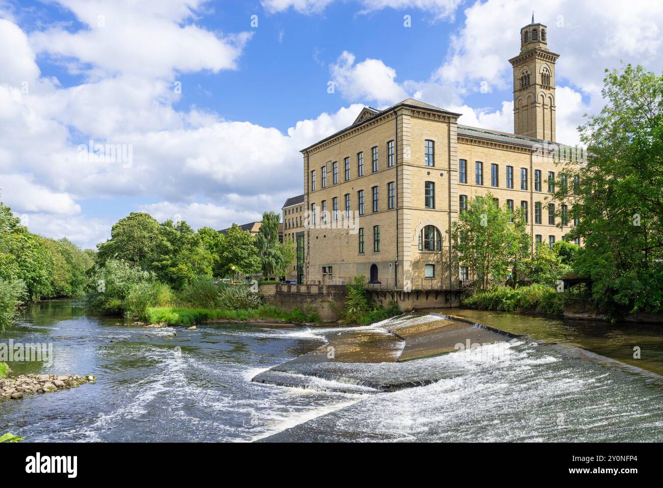 Saltaire Bradford - Salts Mill New Mill and the River Aire weir ...