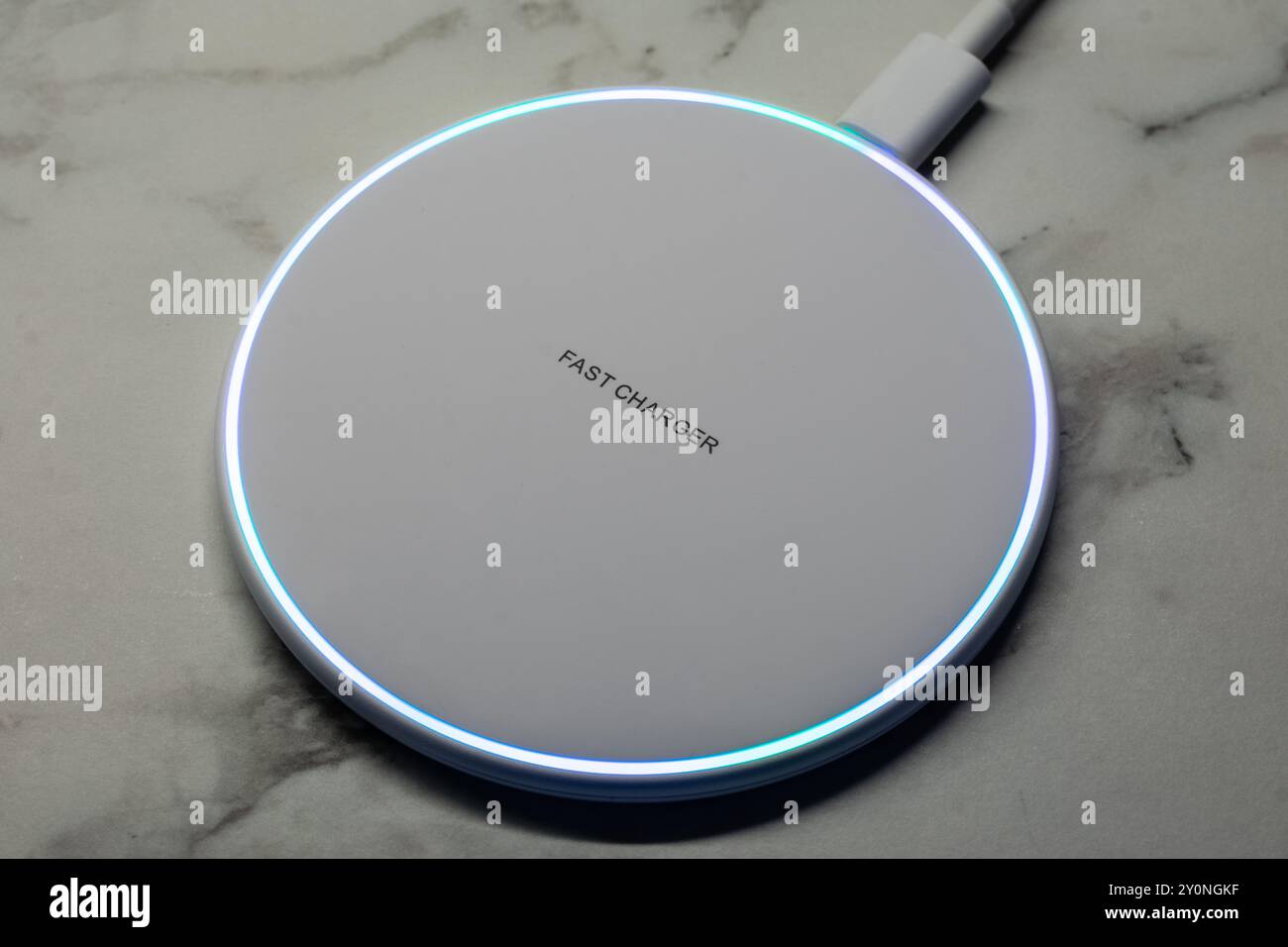 Modern Wireless Magnetic Charger for Mobile Phones with Sleek Design ...