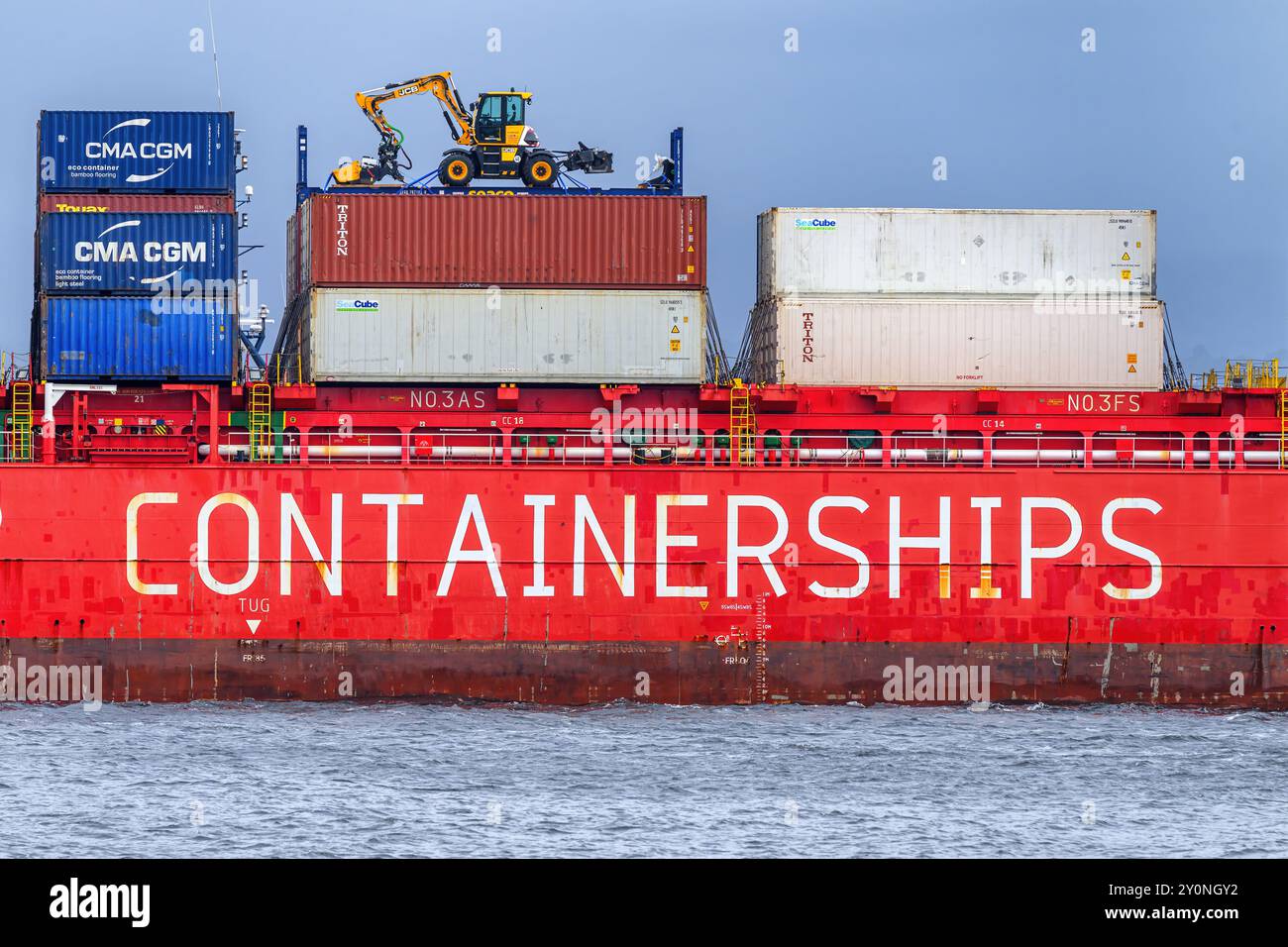 Detail view of containers and deck cargo onboard a Containerships ...
