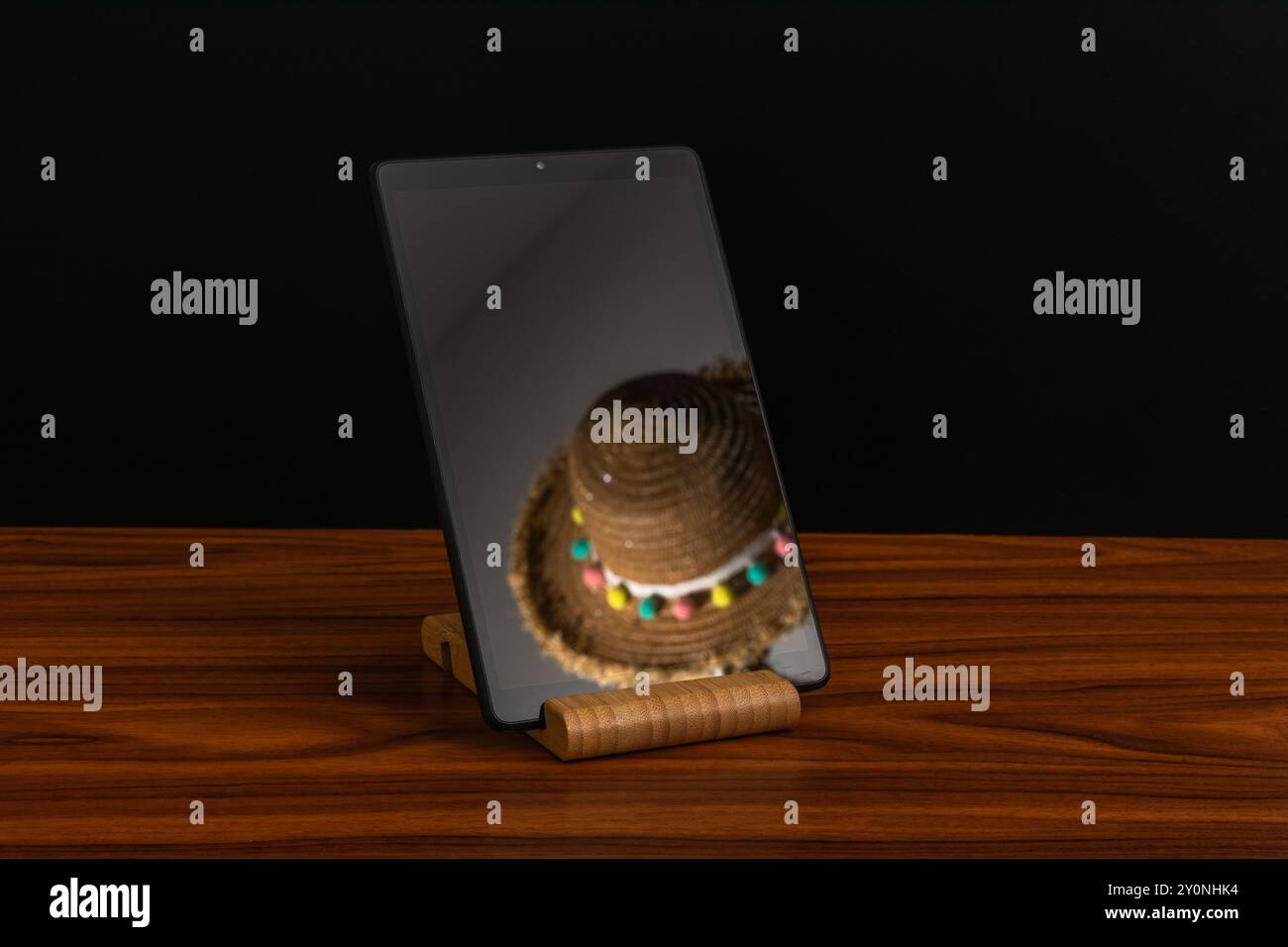 Elegant smart home control panel on a wooden base combining advanced ...