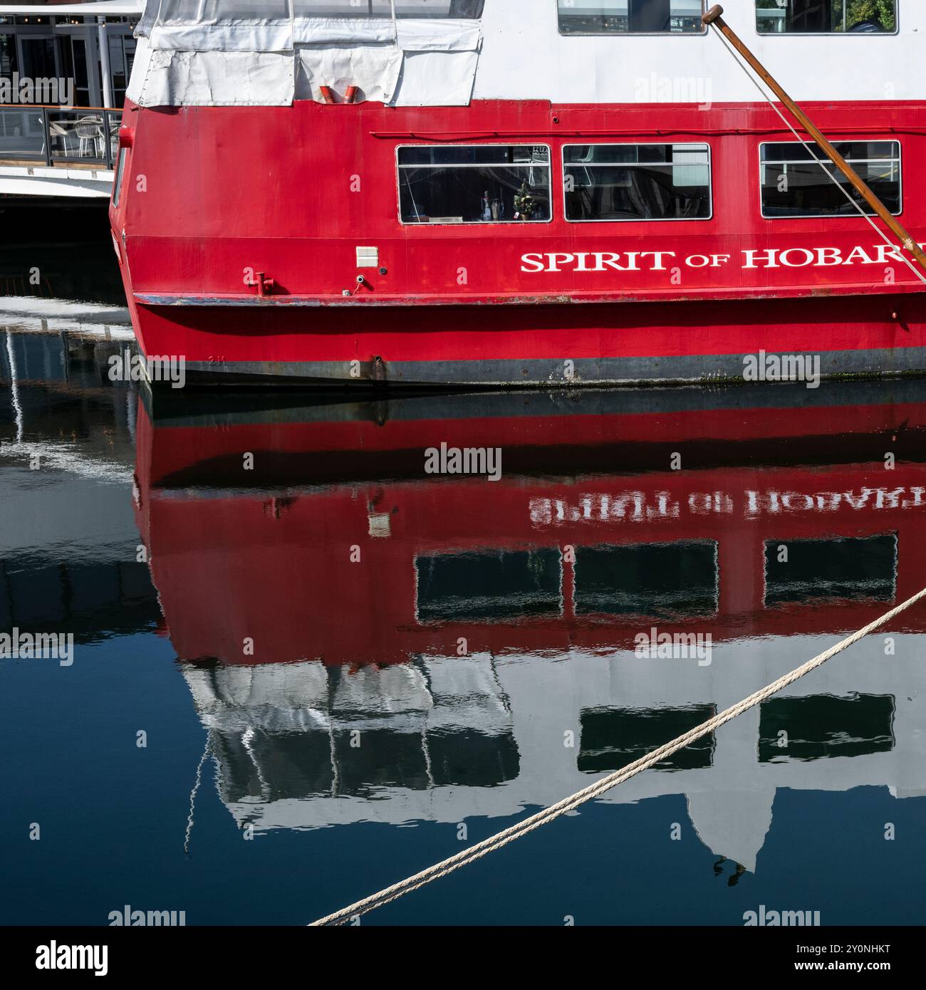 Reflection in the ocean of the Spirit of Hobart ship in the harbor of ...