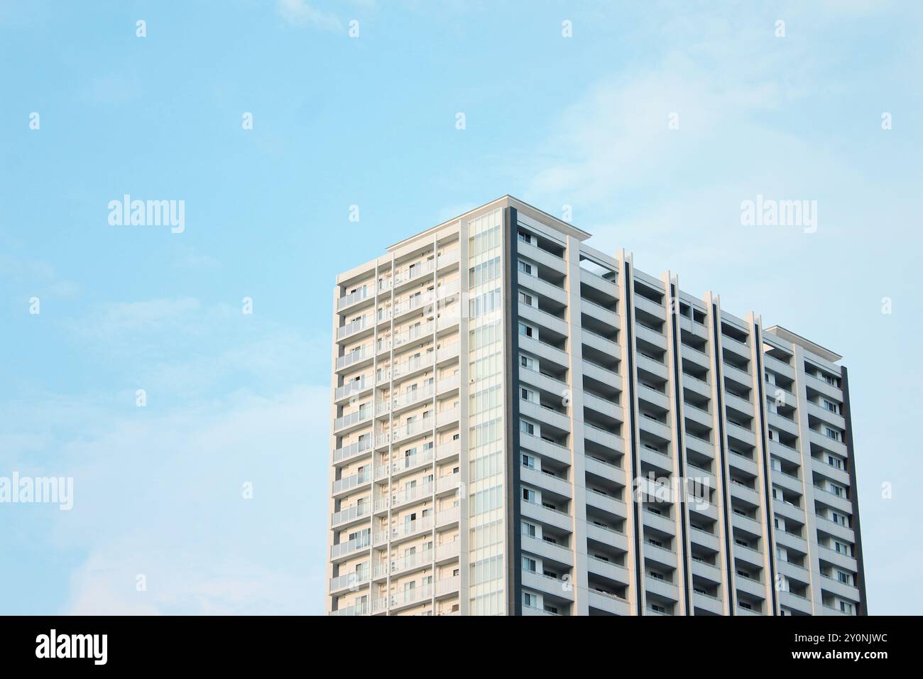 Modern High-Rise Apartment Building Against Clear Blue Sky, Hiroshima ...
