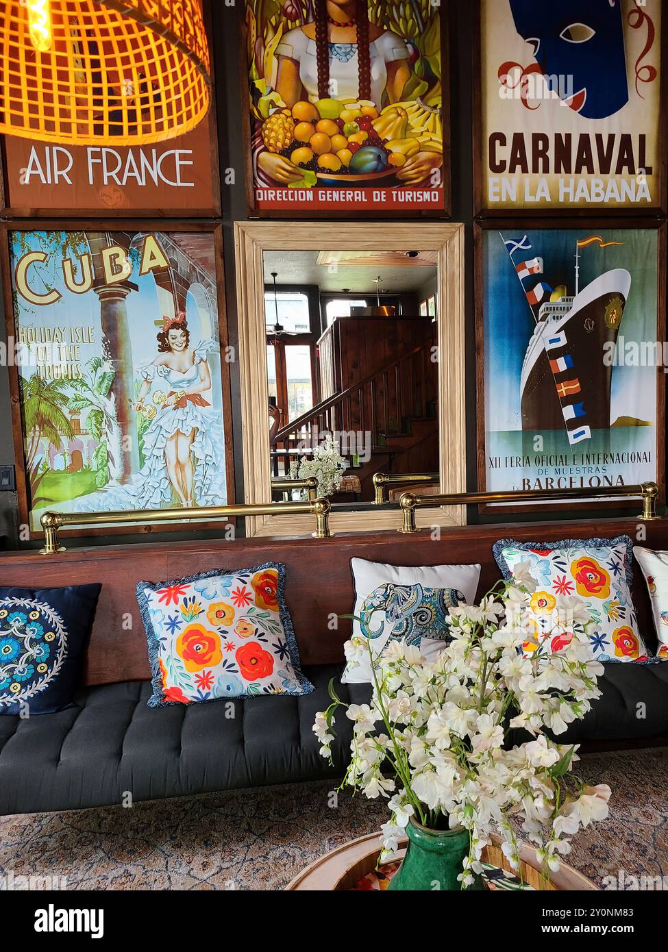 Vintage Travel Posters and Cozy Seating Eye Level Perspective Stock ...