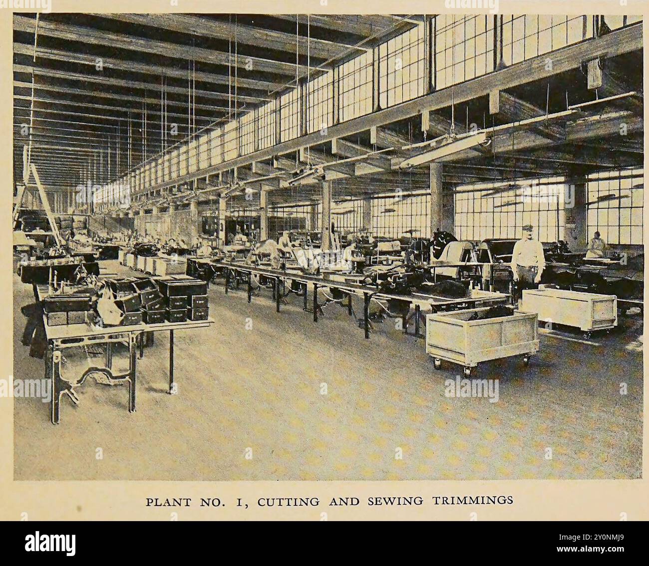 Workers working on factory line Cutting and Sewing Trimings at ...