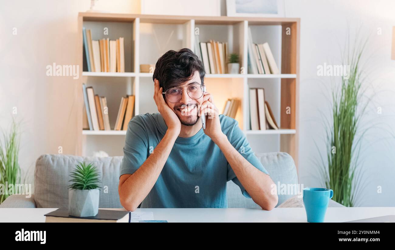 Happy phone call. Mobile communication. Pleased satisfied smiling guy ...