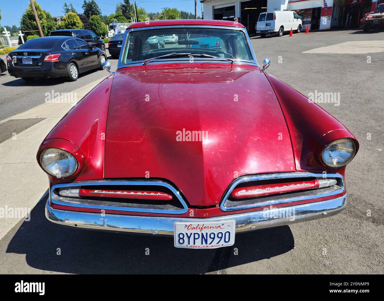 Seattle, WA, USA -July 3, 2024: Studebaker Champion Commander Starlight Coupe red color front ...