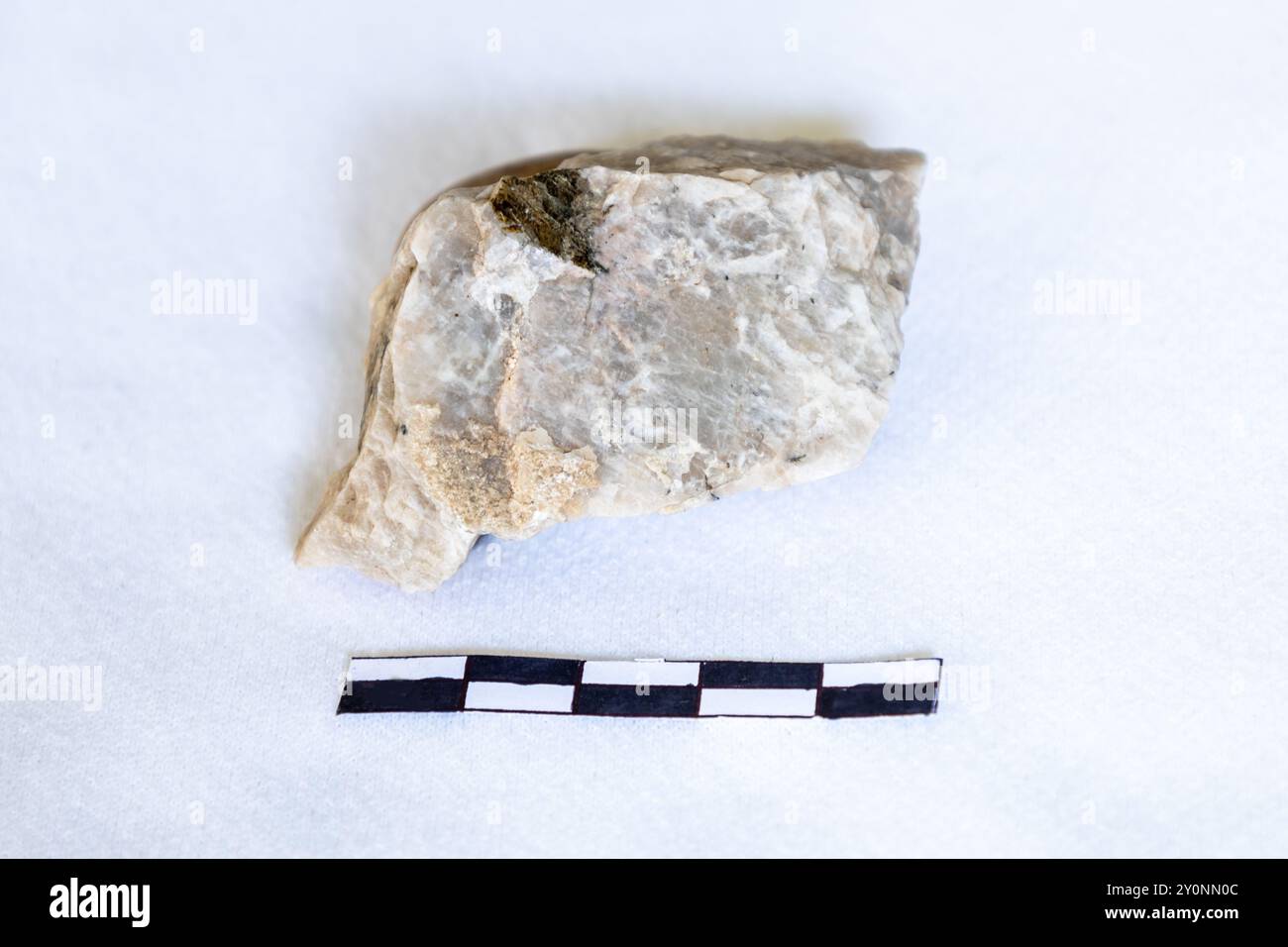 A piece of plagioclase feldspar (NaAlSi3O8) from a pegmatite along the ...
