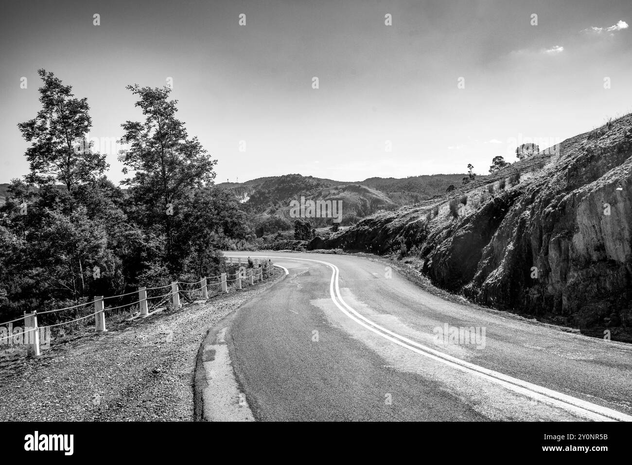 Road through the countryside in Queenstown, a town with a population of ...