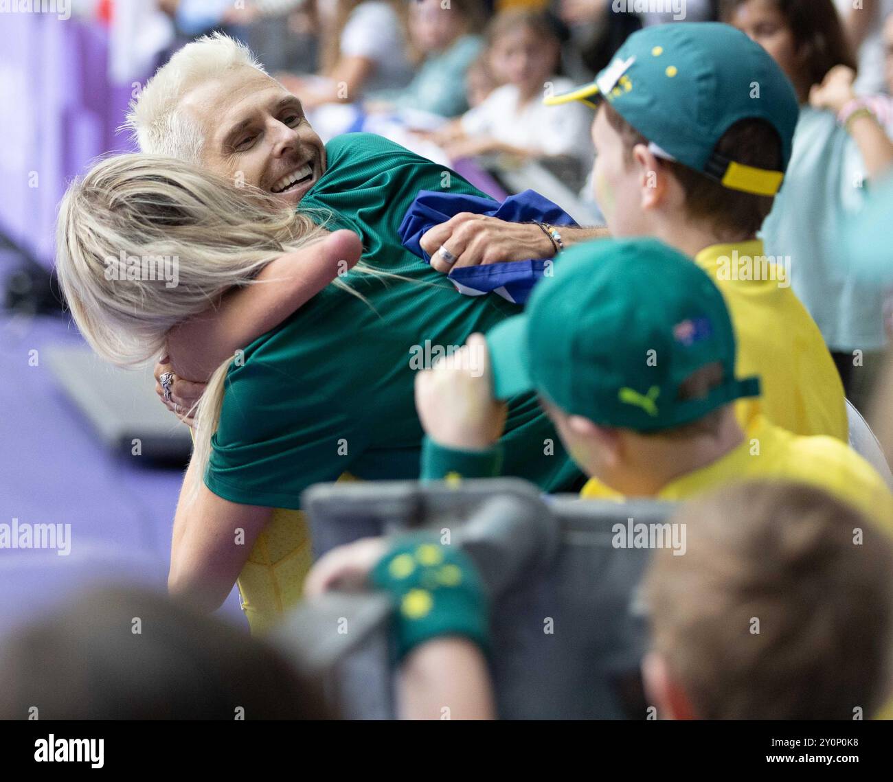 Michael Roeger of Australia celebrates with his family after the t47 ...