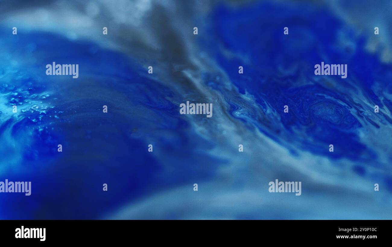 Glitter ink splatter. Fluid spill. Defocused blue color grain texture ...