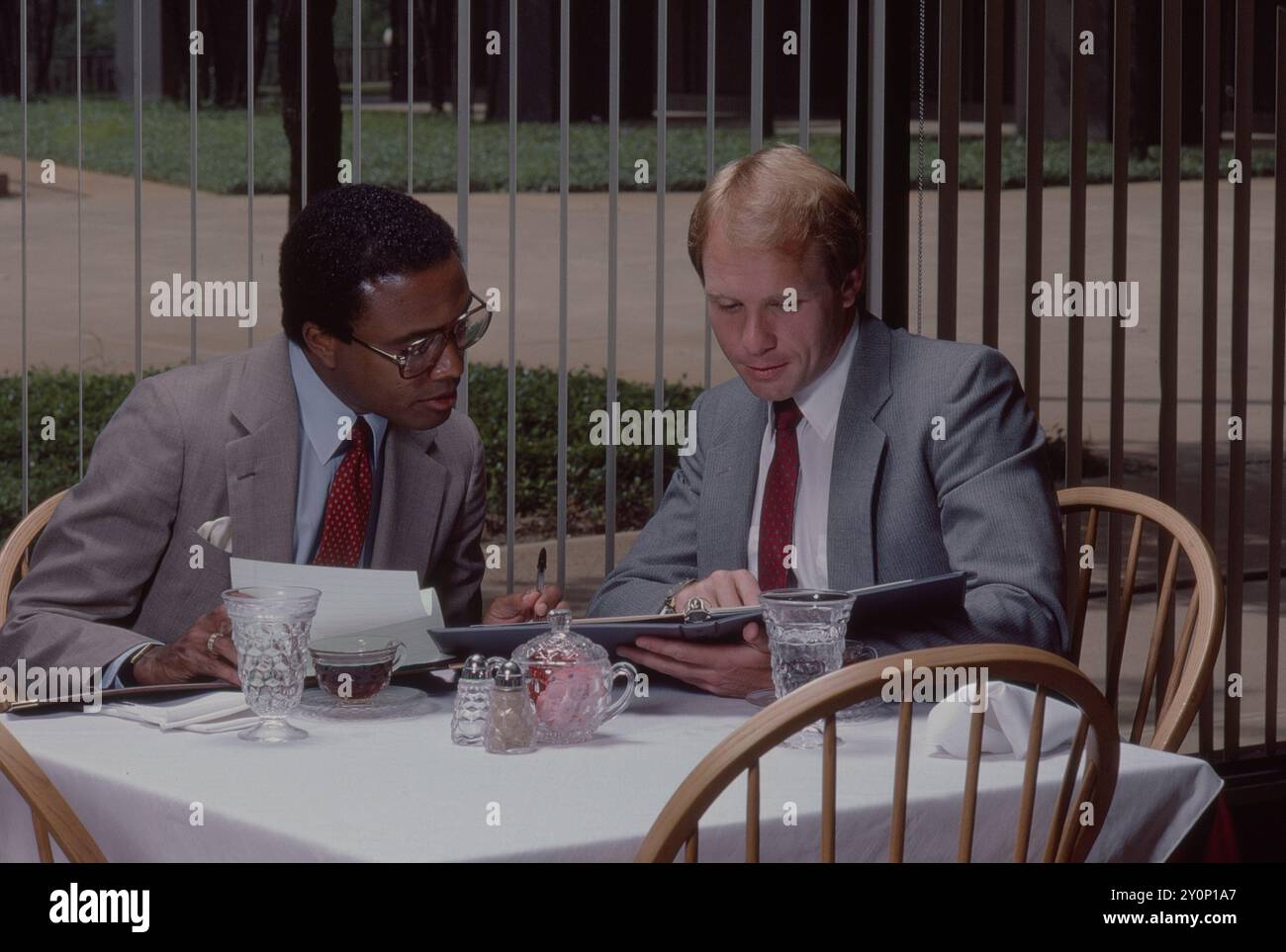 Salesmen in cafe for meeting Stock Photo - Alamy