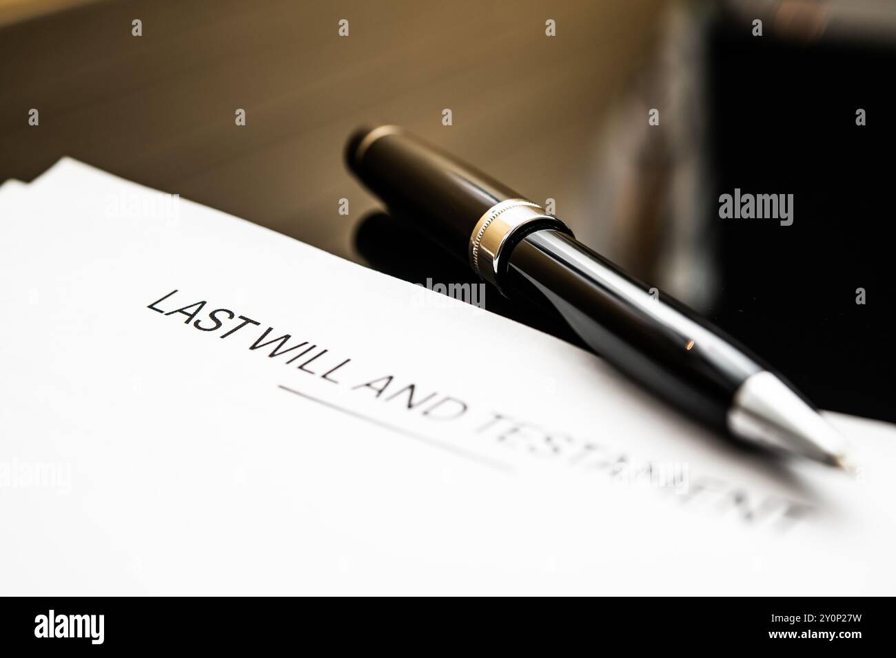 A close-up of a last will and testament document accompanied by a ...
