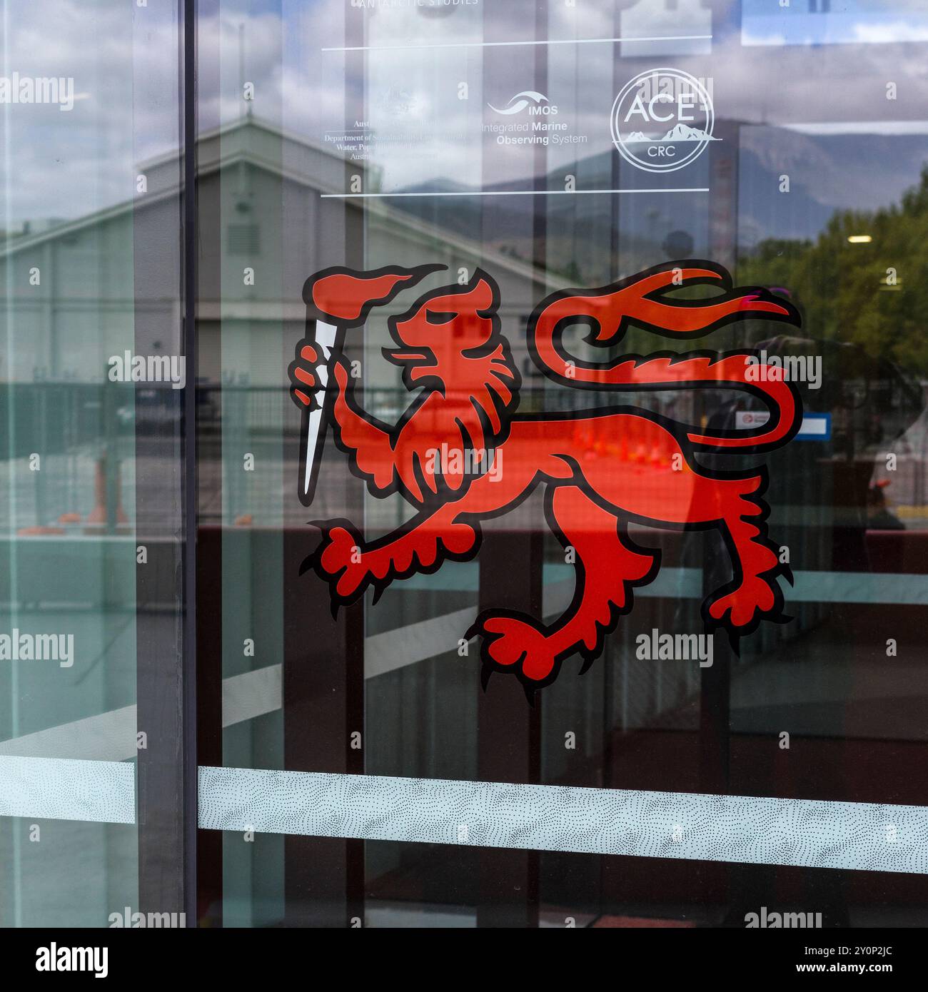 Window showing the red insignia symbol for the IMAS, Institute For ...
