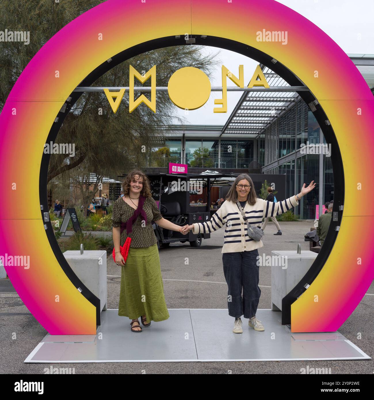 Two women standing under an archway at the Mona, Mona – Museum of Old ...