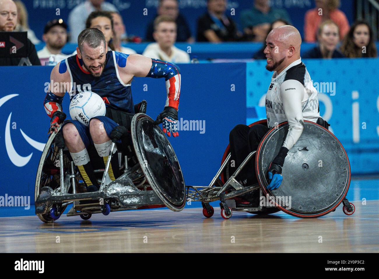 United States Josh Wheeler (10) is defended by Japan Seiya Norimatsu ...
