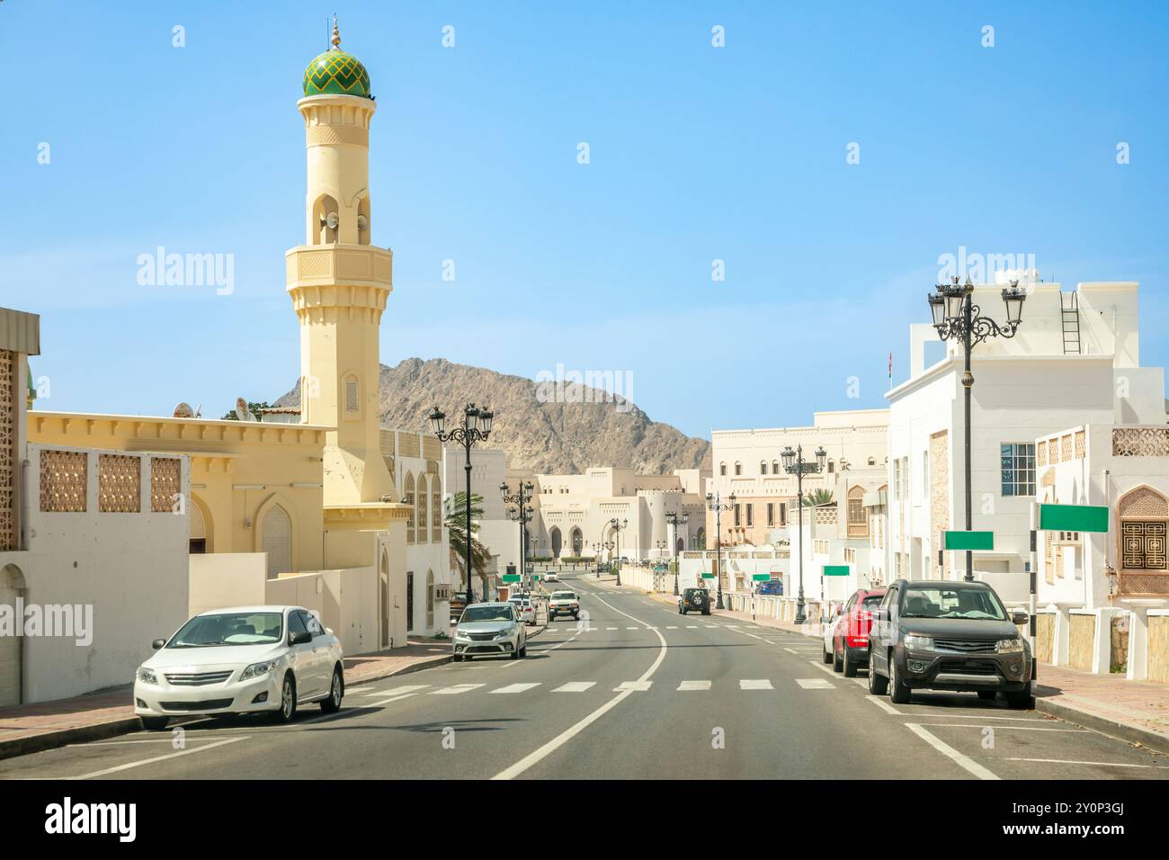 Muscat Takia historical city center streets with road and cars and ...