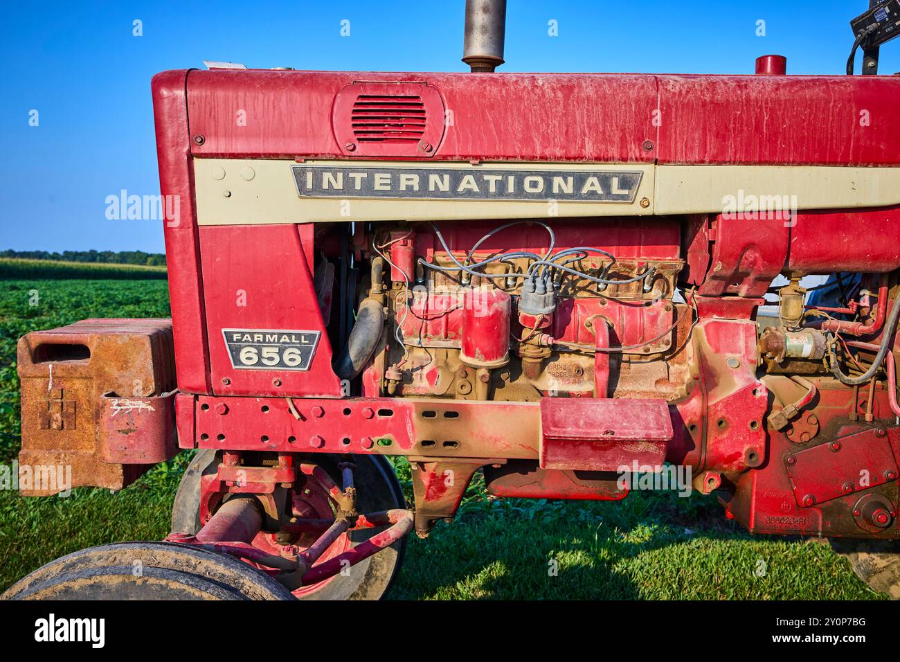 Vintage Red Farm Tractor Engine Close-Up in Rural Field Stock Photo - Alamy