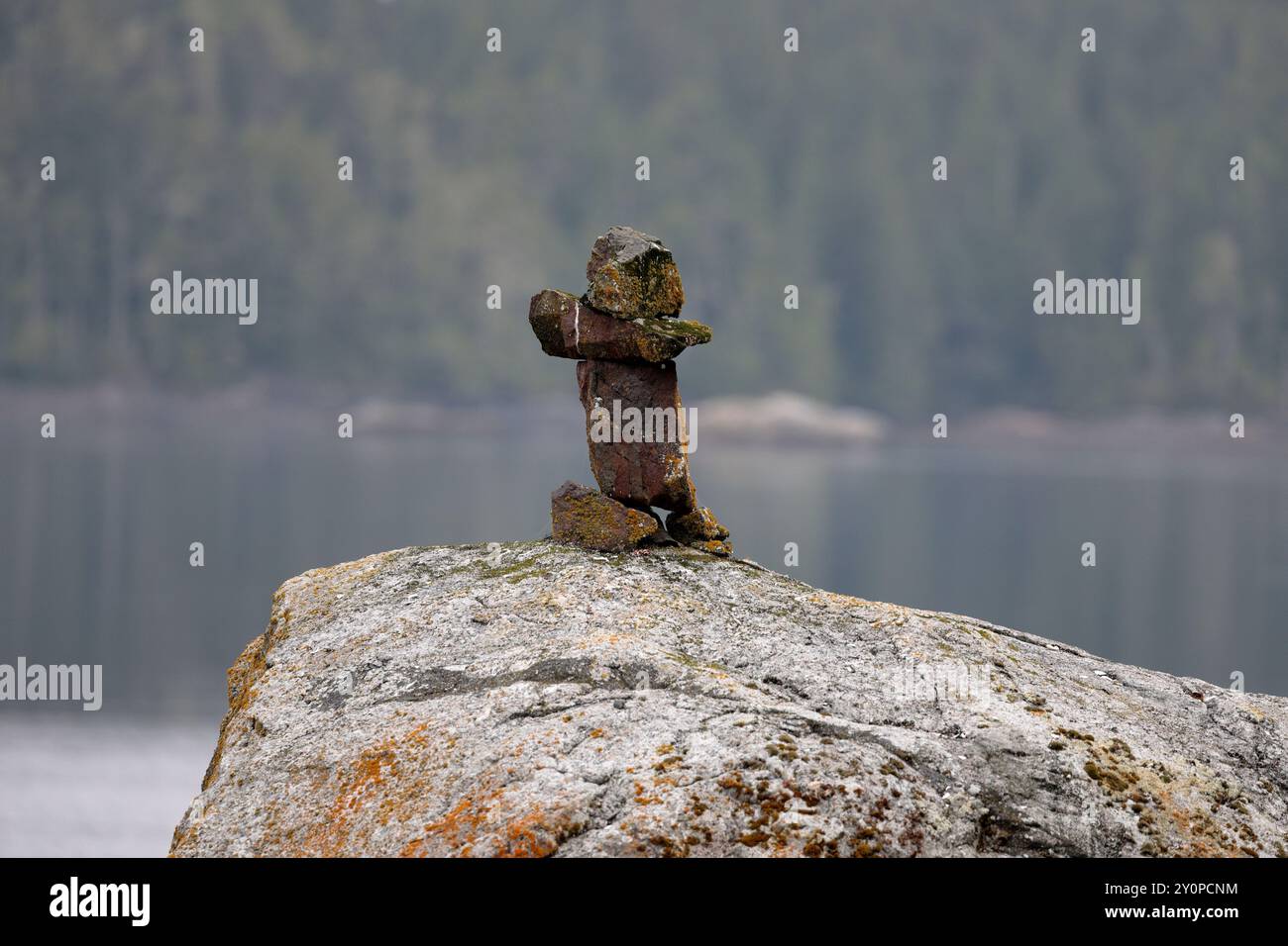 Traditional Canadian indigenous memorial statue made from stacked rocks ...