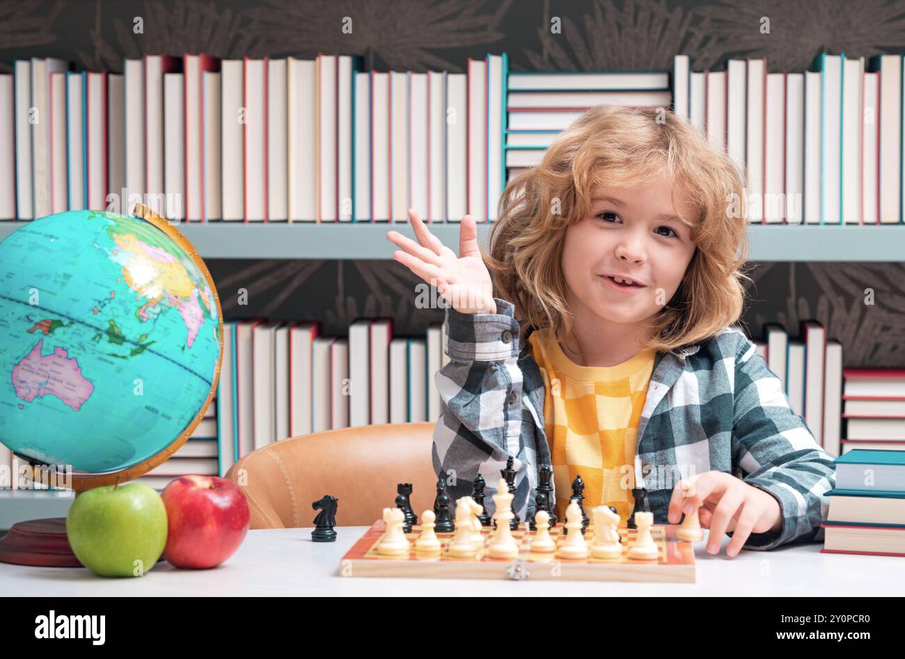 Chess school. Kid playing chess. Clever child thinking about chess. Kids early development Stock ...