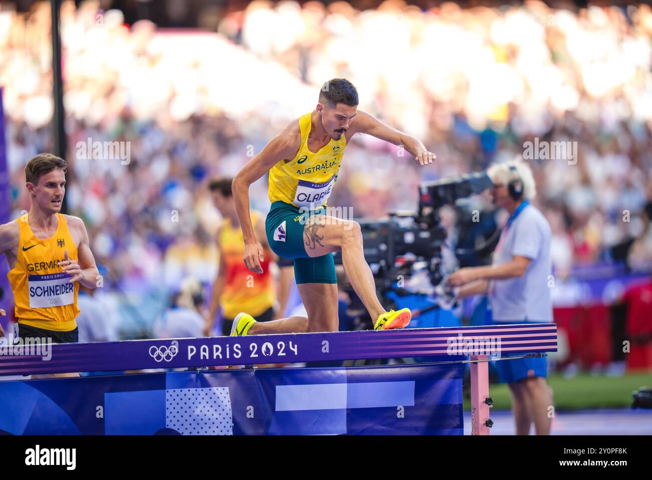 Matthew Clarke participating in the 3000 meters steeplechase at the ...