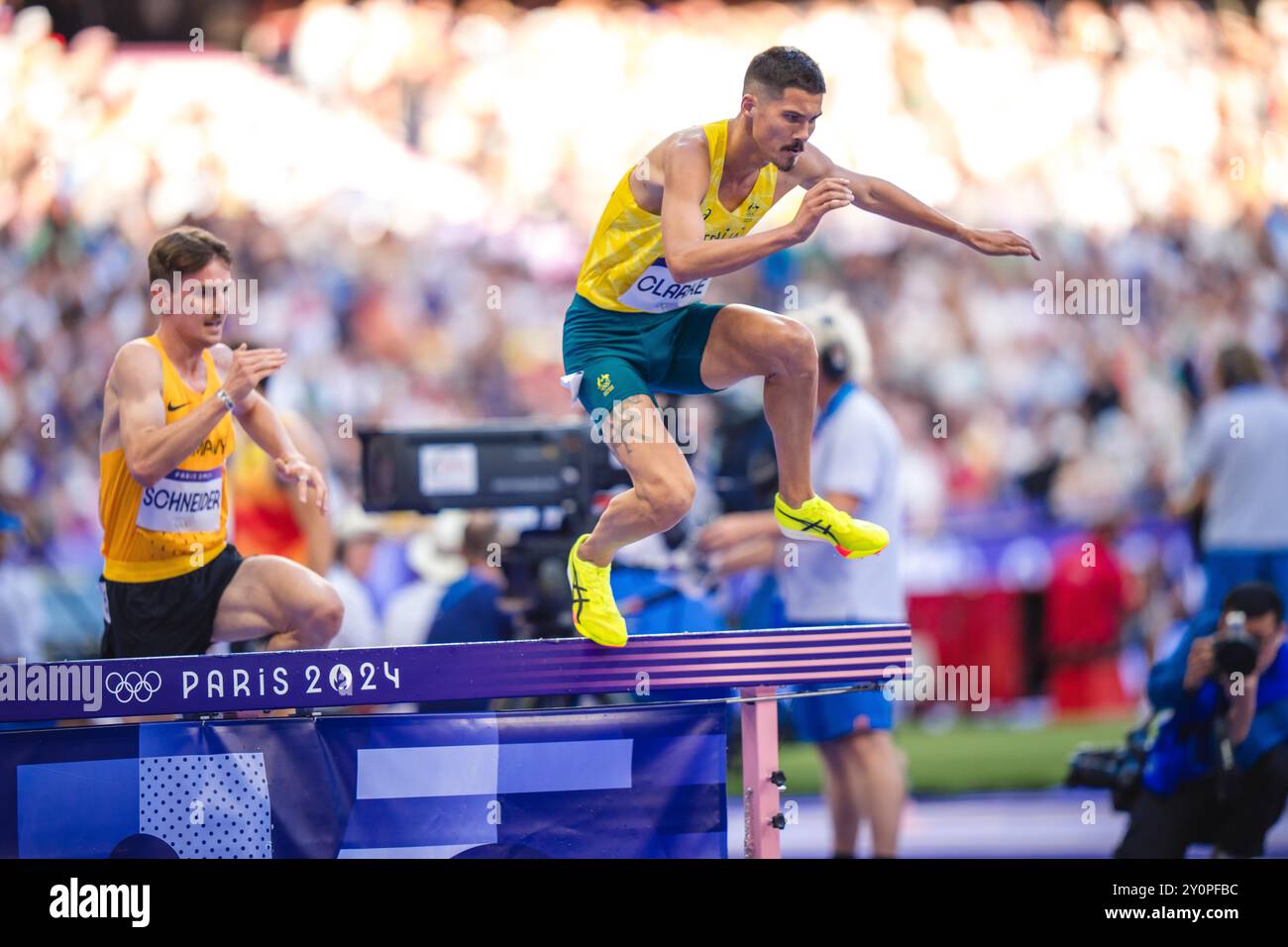 Matthew Clarke participating in the 3000 meters steeplechase at the ...