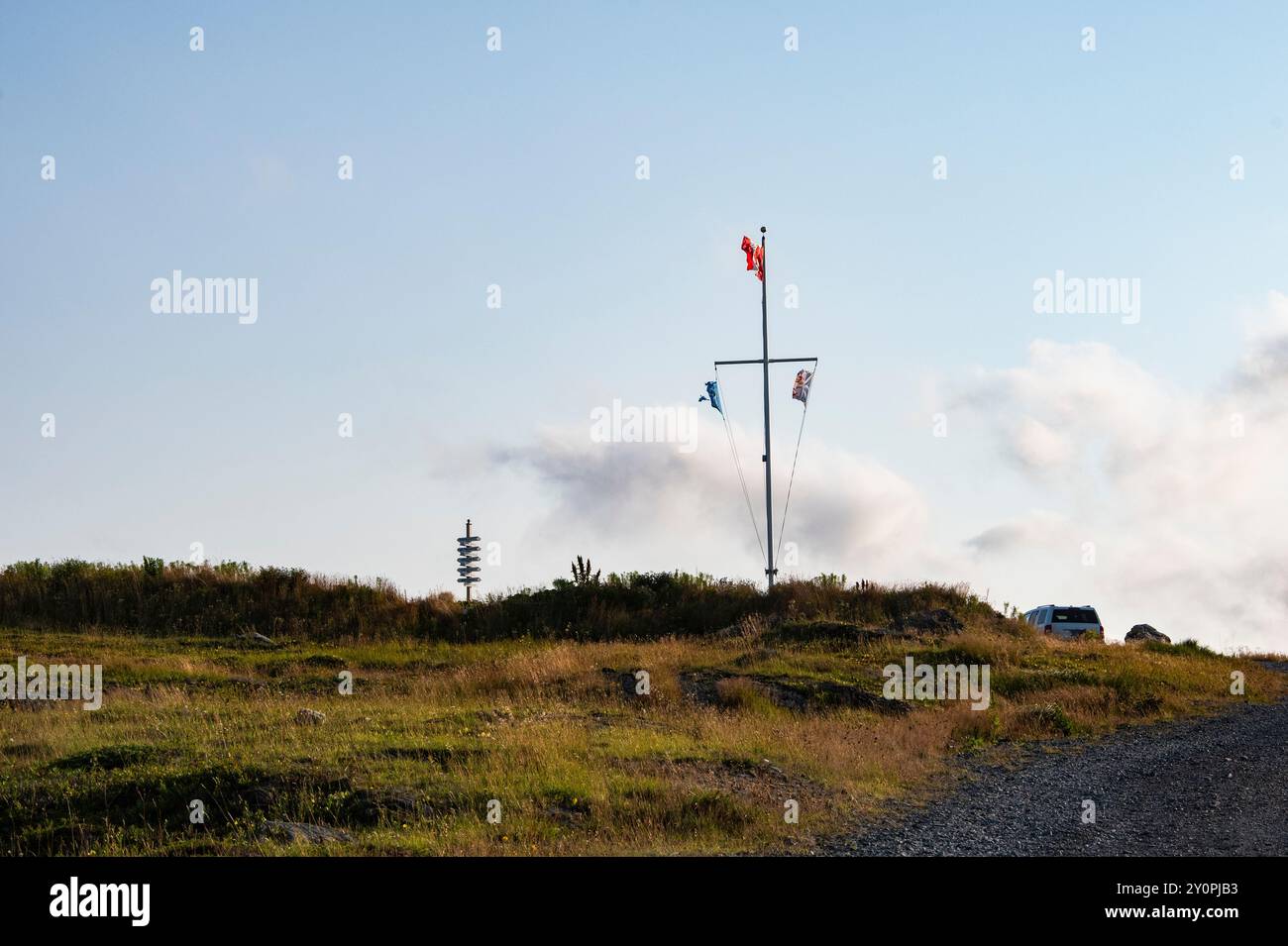 Flags flying at Green Point Lighthouse in Port de Grave, Newfoundland ...