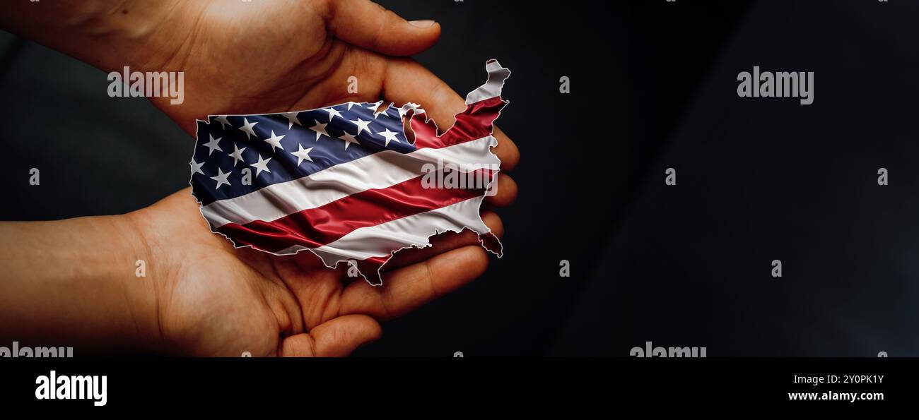 Male hands holding Flag of the United States of America, shape of the ...