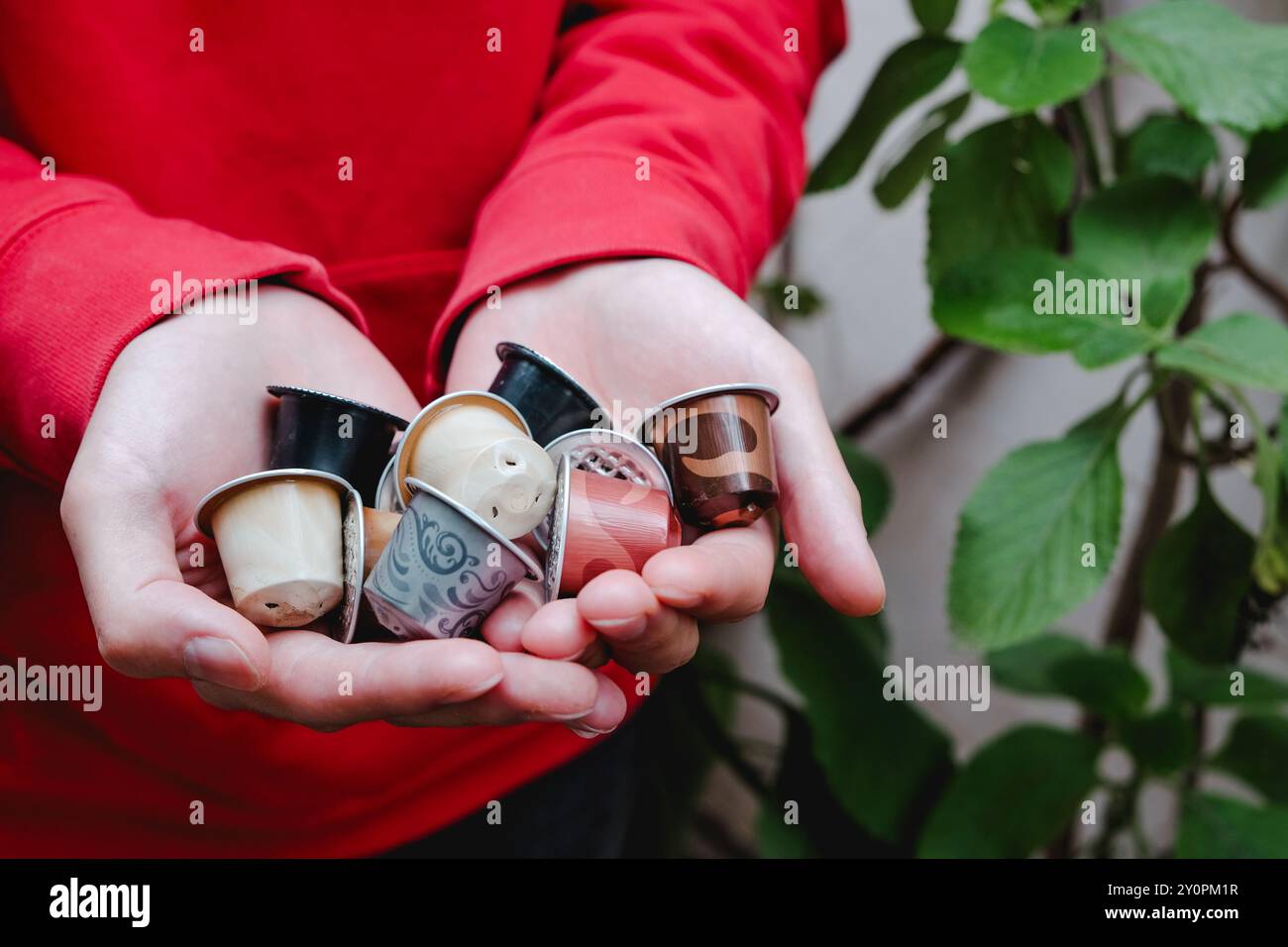 Coffee Pods. Man Holding A Bunch Of Used Coffee Capsules With Blurred ...