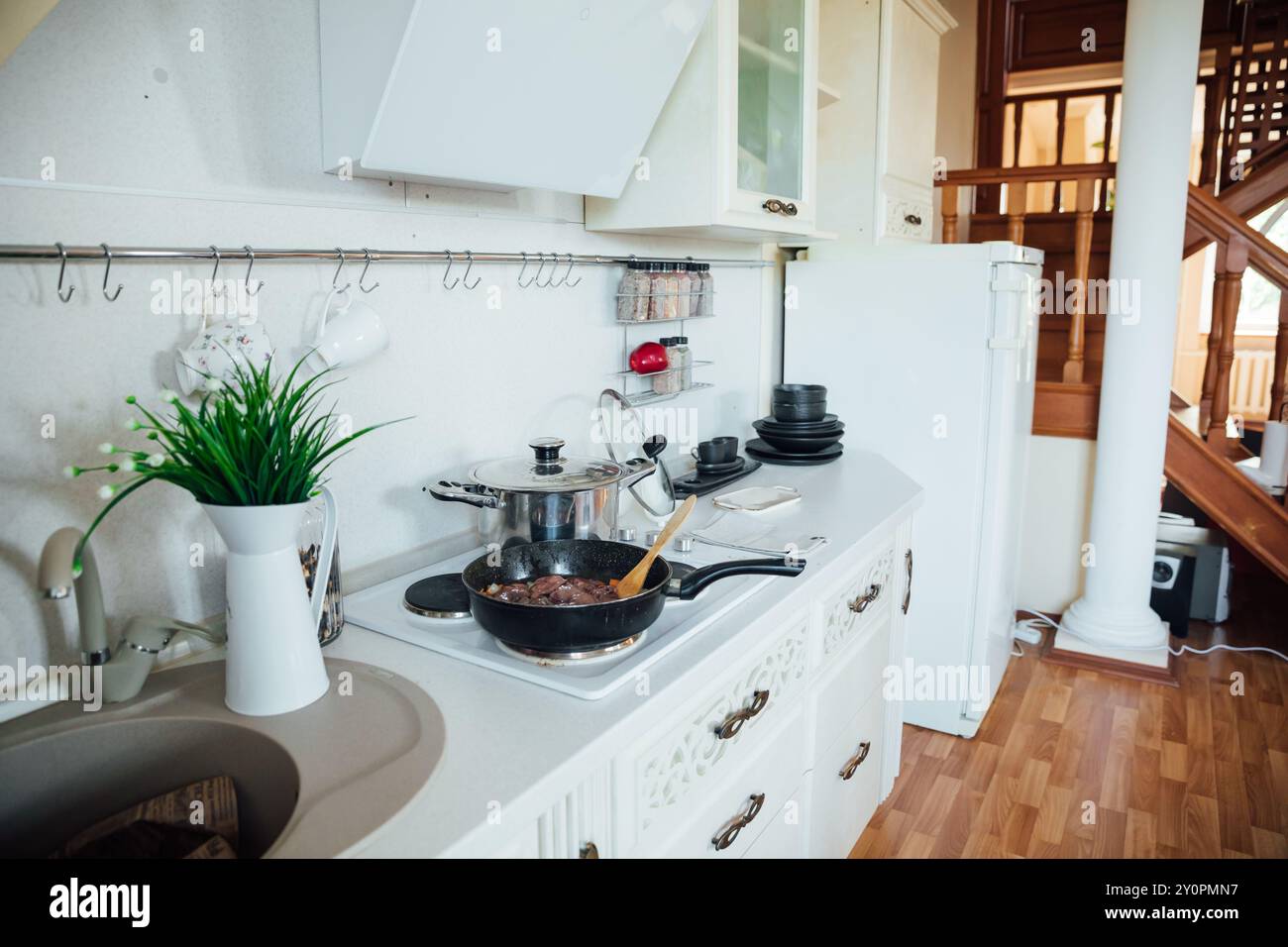 Kitchen interior for cooking on stove Stock Photo - Alamy