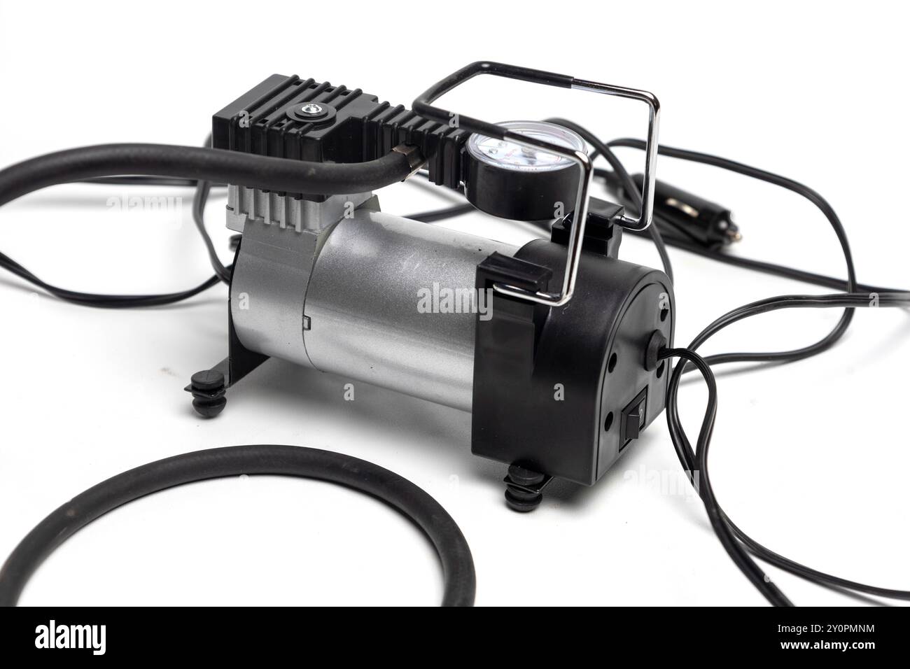 Car mini compressor on white Stock Photo - Alamy