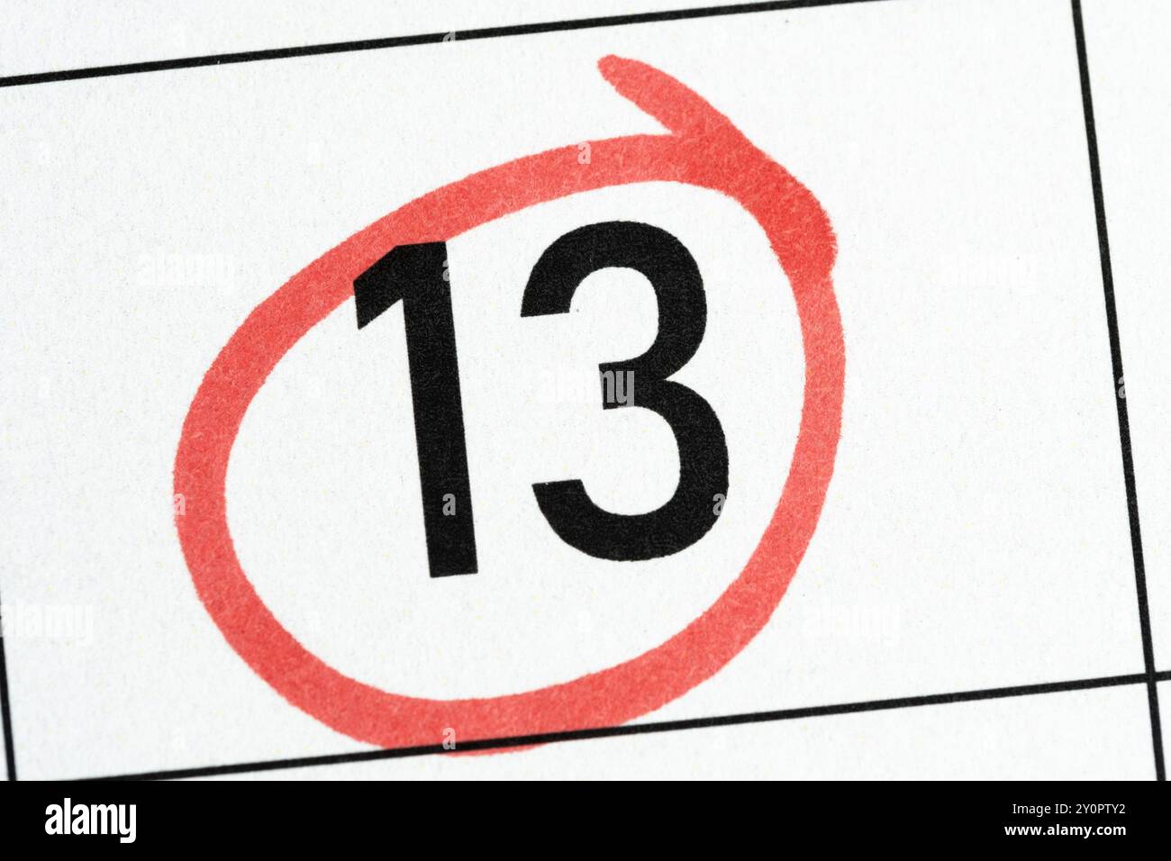 Thirteenth number in calendar is circled with red marker Stock Photo ...