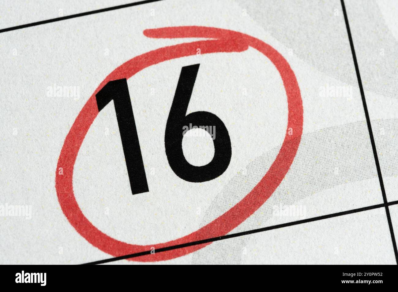Sixteenth number in calendar is circled with red marker Stock Photo - Alamy