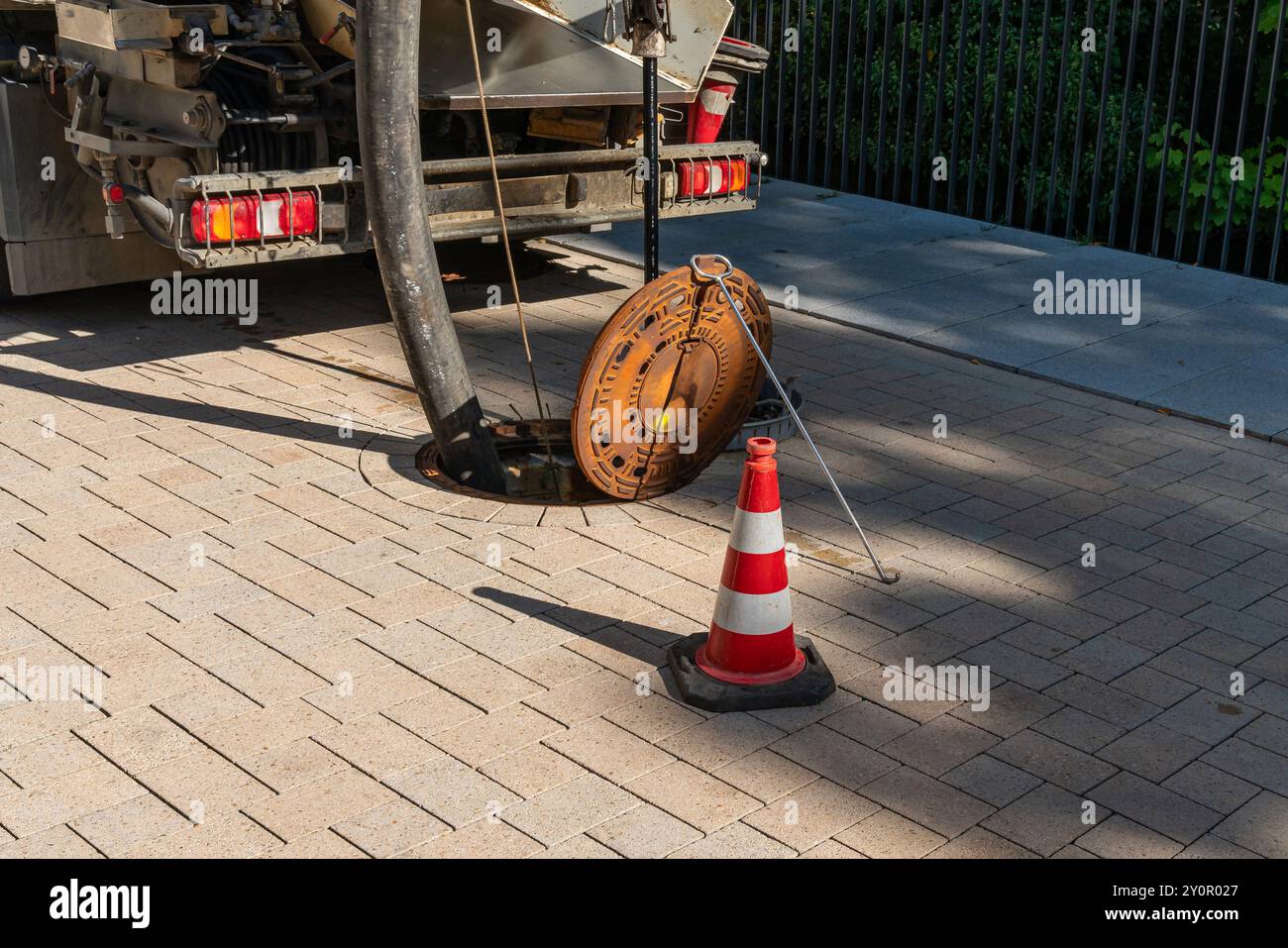 Industrial hose connected sewer cleaning hi-res stock photography and ...
