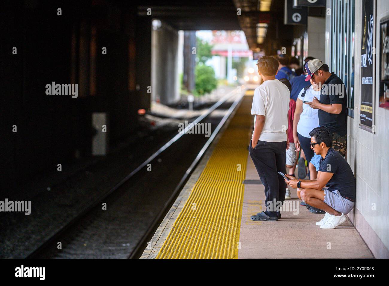 Passengers awaiting for the Hoboken train at Secaucus on track E Stock ...