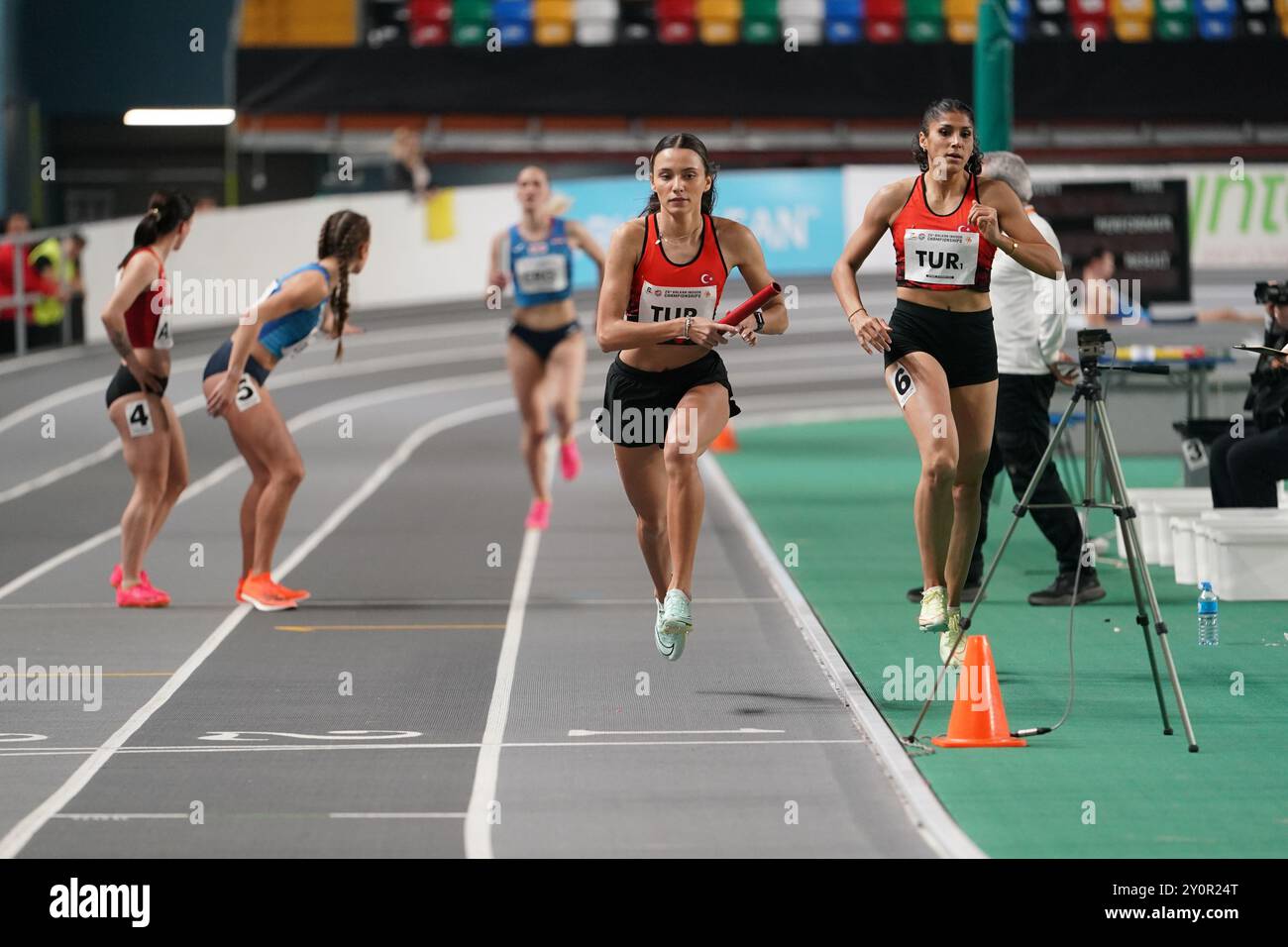 ISTANBUL, TURKIYE - FEBRUARY 10, 2024: Athletes running 4x400 metres ...