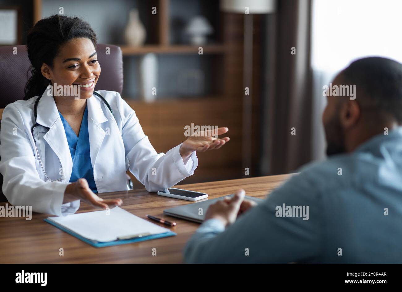 African american female doctor having hi-res stock photography and ...