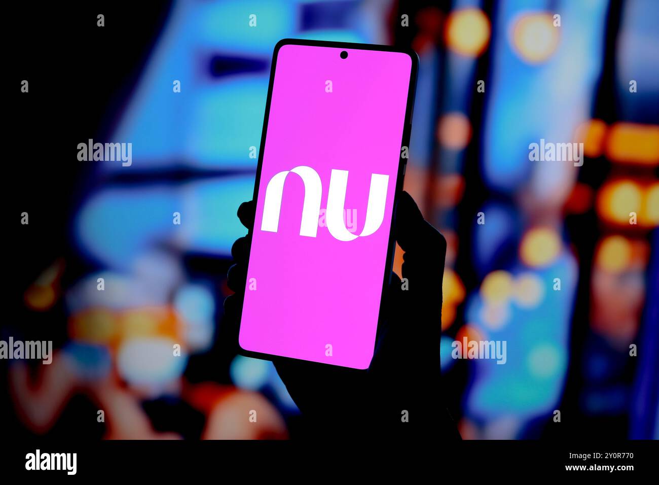 In this photo illustration, the Nu Holdings (Nubank) logo is displayed ...